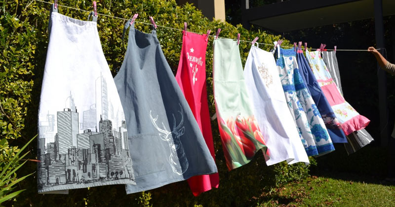 Why does sunlight fade our clothes and what colors fade the most?